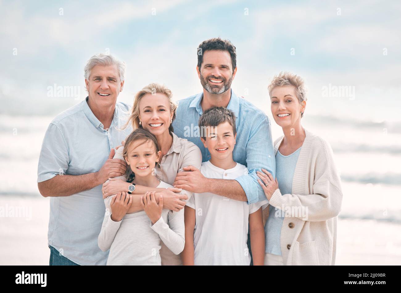 Young man staying with family hi-res stock photography and images - Alamy