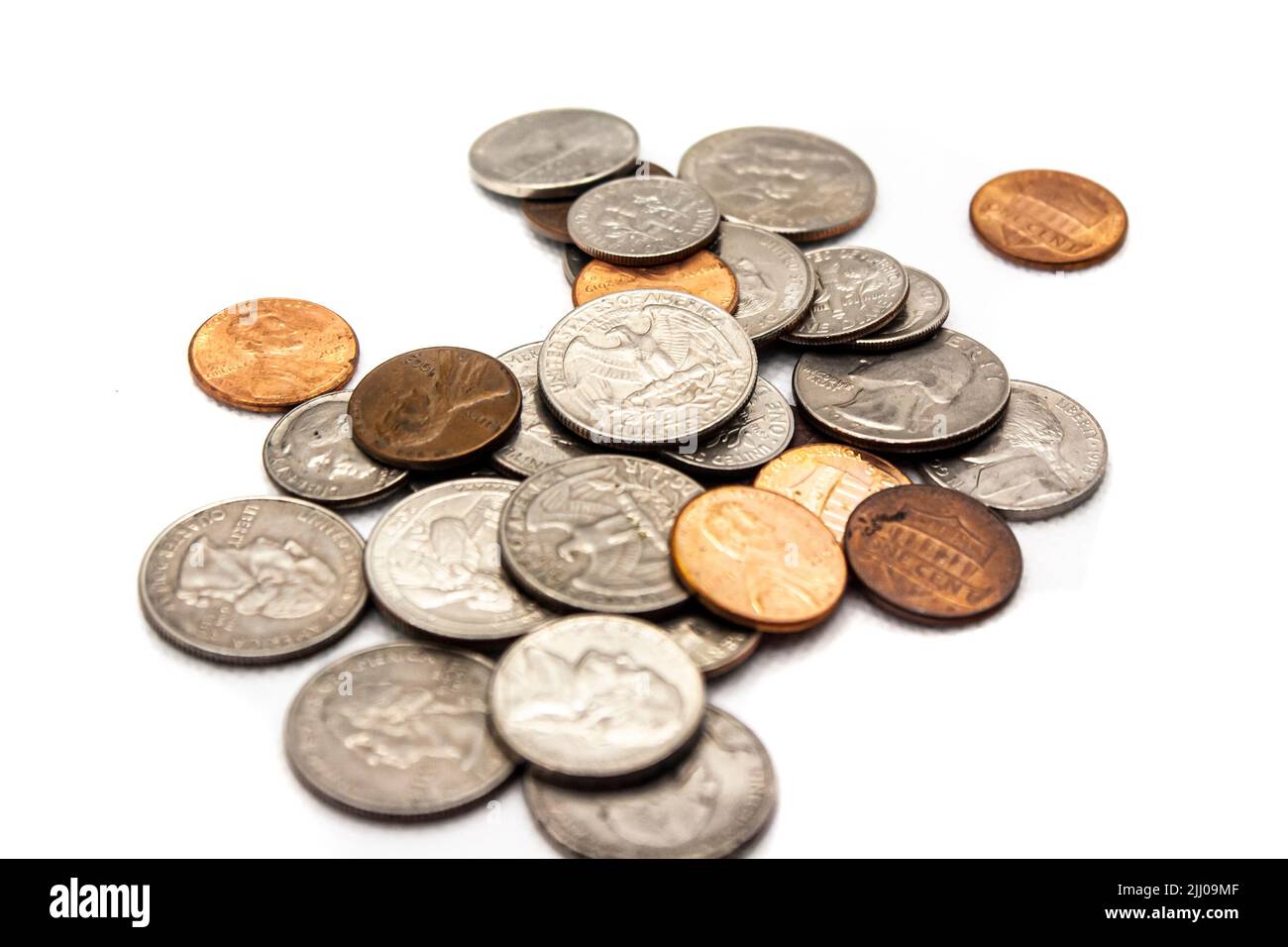 Coins isolated on a white background Stock Photo - Alamy
