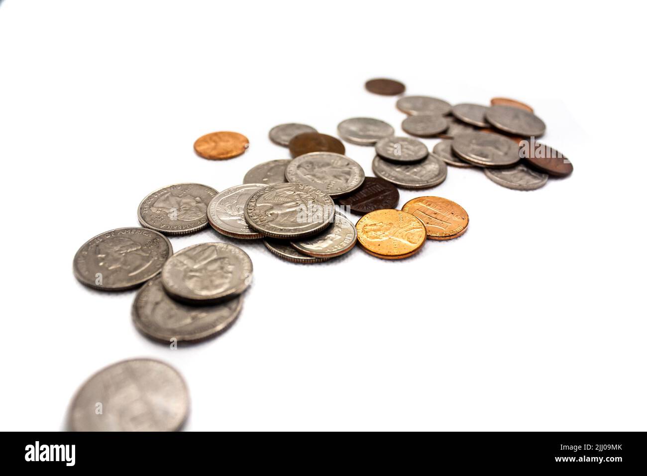 Coins isolated on a white background Stock Photo - Alamy