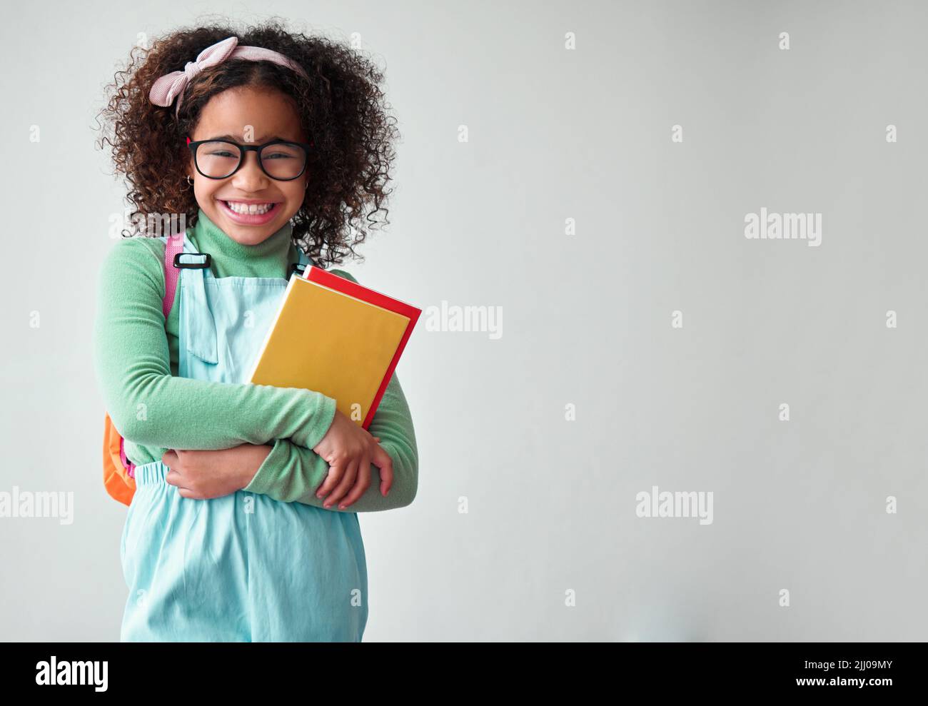 Shell never outgrow your heart. a little girl wearing glasses and ...