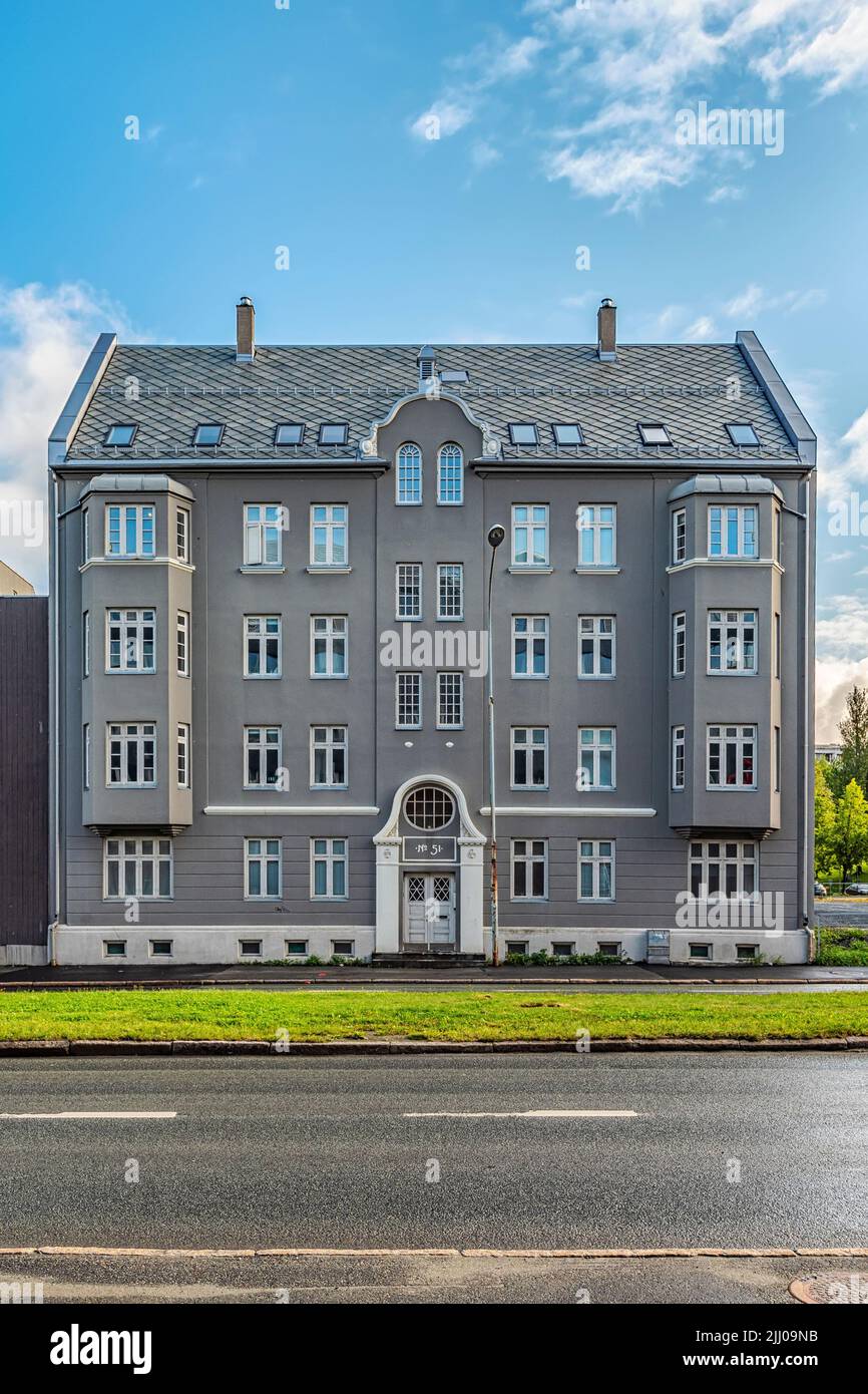 A vertical shot of an old-fashioned renovated building facade Stock ...