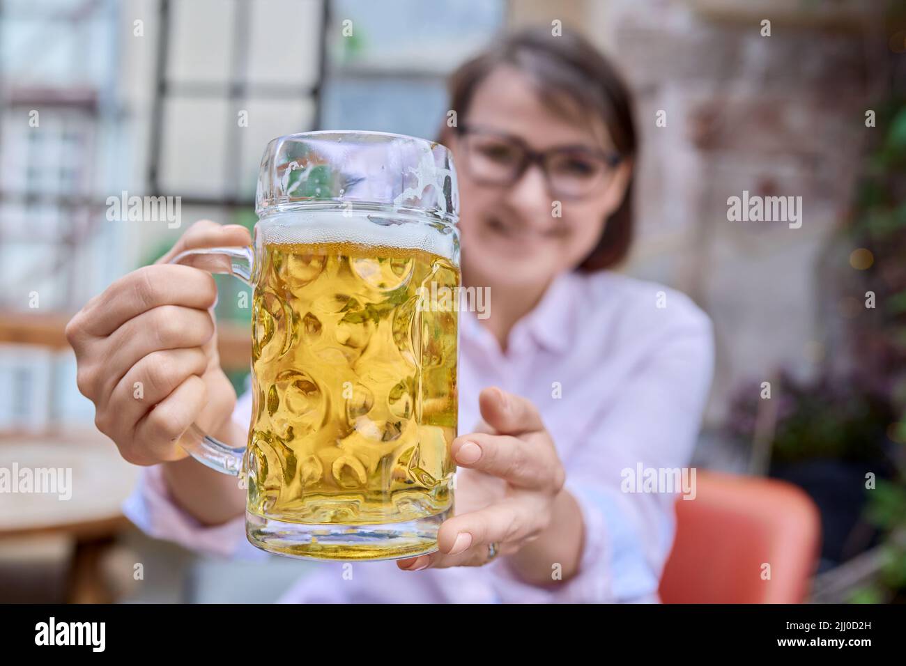 Glass beer pub alcohol hands hi-res stock photography and images - Alamy