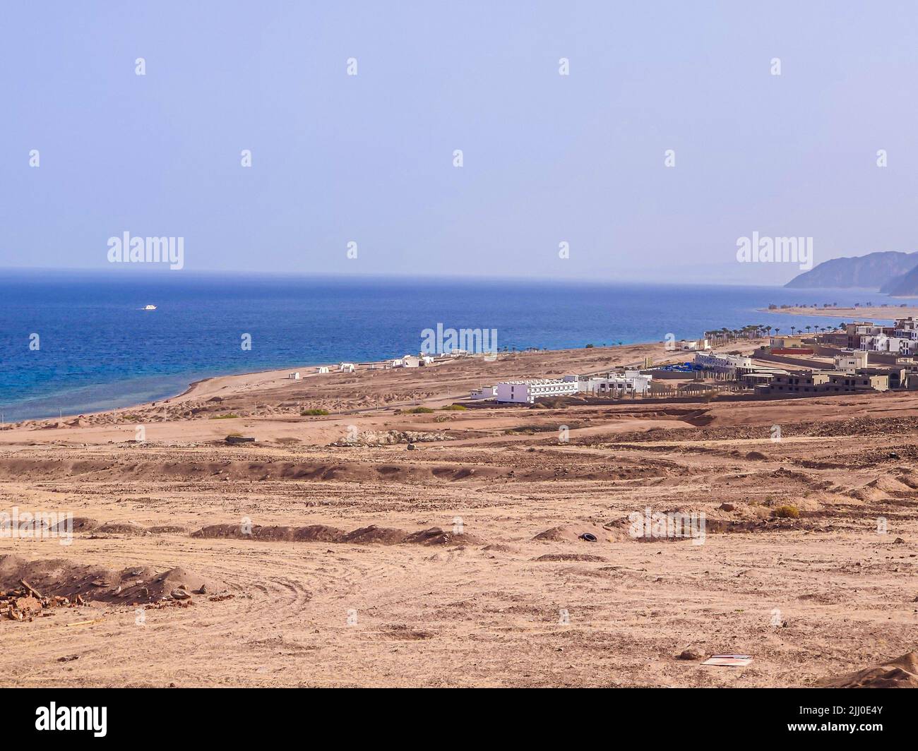 Rock and stones on the seashore on one of the beaches in Ras Shitan ...