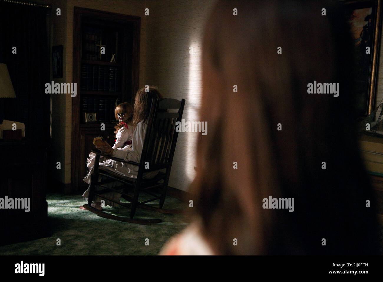 GIRL, DOLL ON ROCKING CHAIR, THE CONJURING, 2013 Stock Photo - Alamy