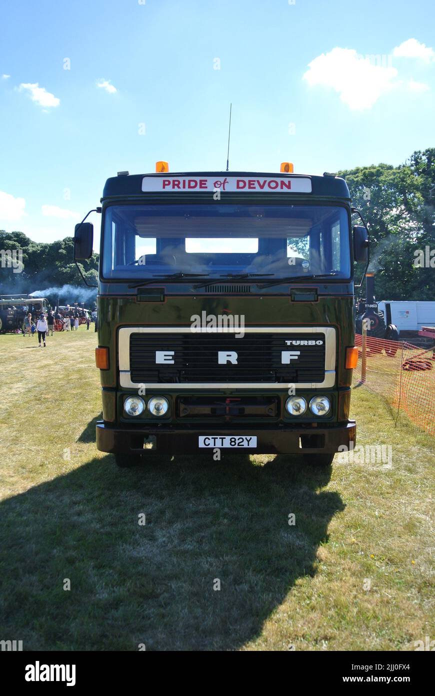 A 1982 ERF C40 lorry with low loader trailer parked on display at the ...