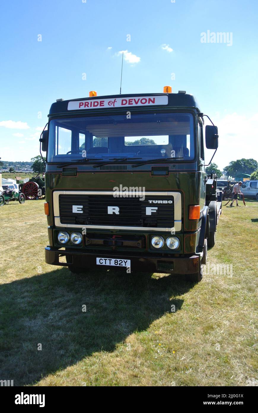 A 1982 ERF C40 lorry with low loader trailer parked on display at the ...