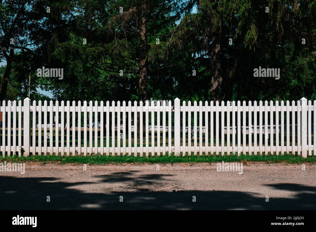 A white picket fences Stock Photo - Alamy