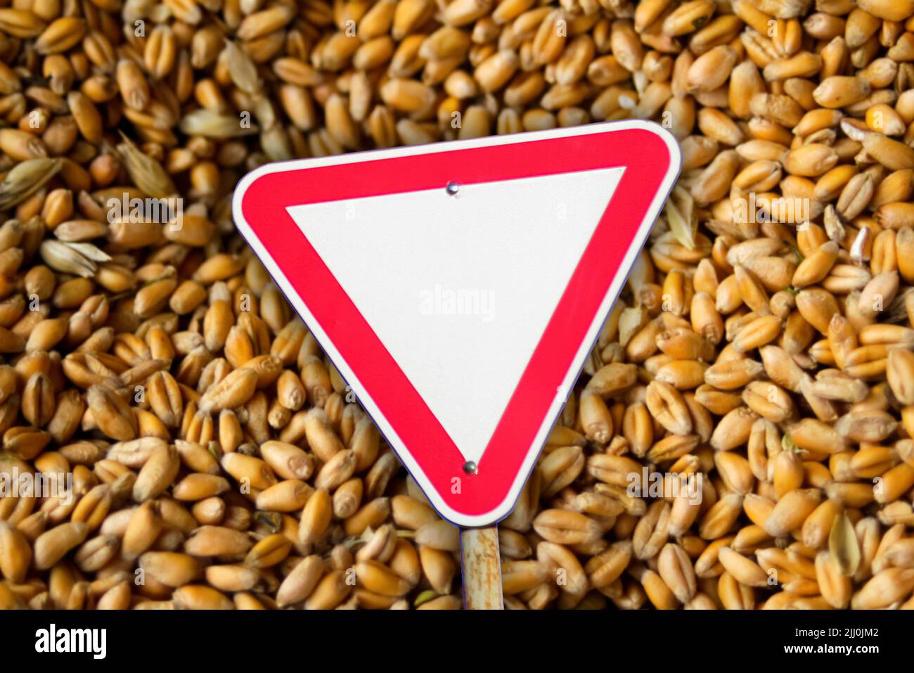 Food crisis concept. Red road sign. Defocus blank empty triangle red ...
