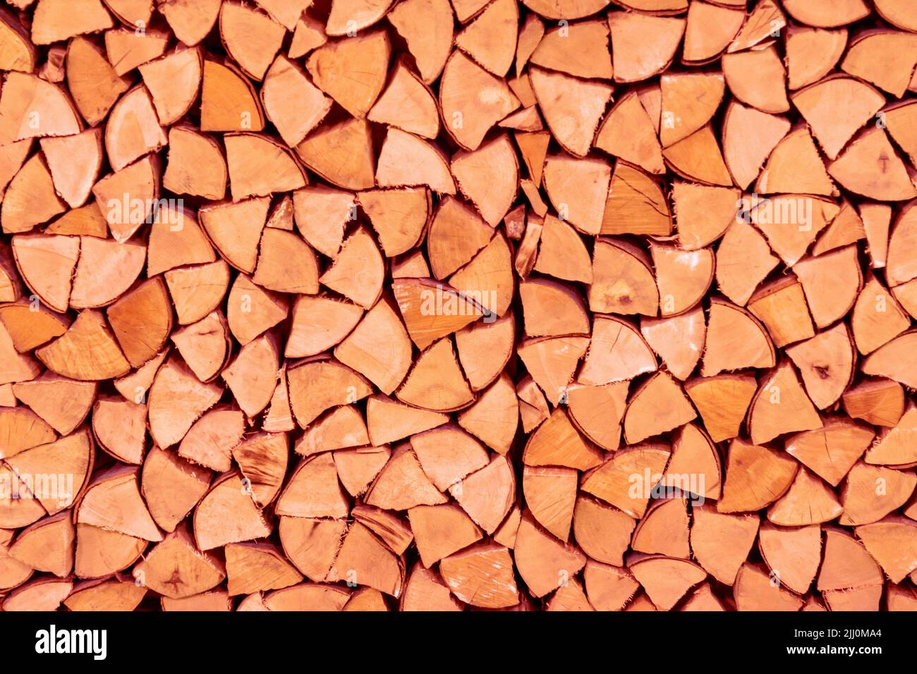 Large pile of firewood logs pattern background outdoors Stock Photo - Alamy