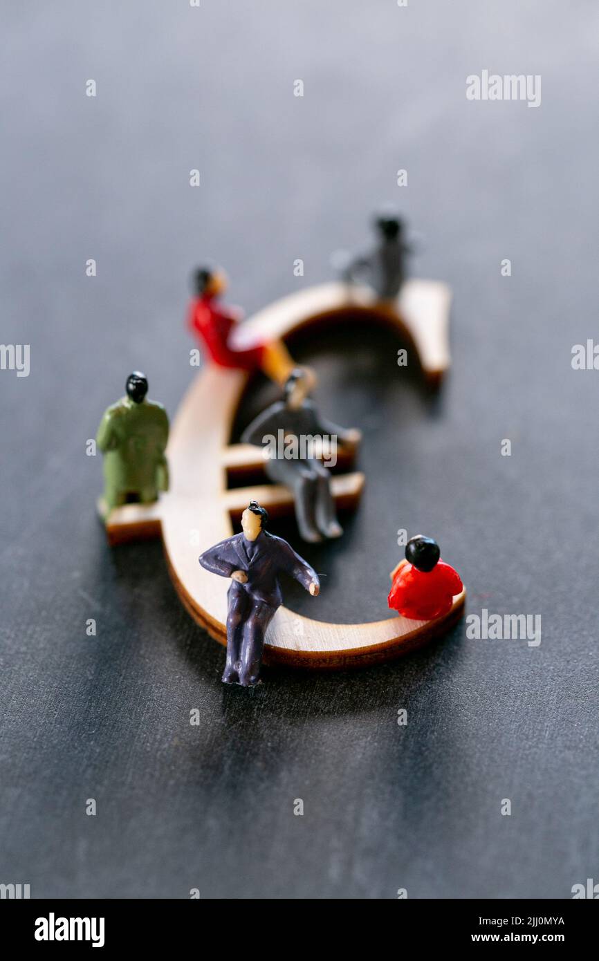Euro inflation. Euro sign and figurines of people.Taxpayers symbol ...
