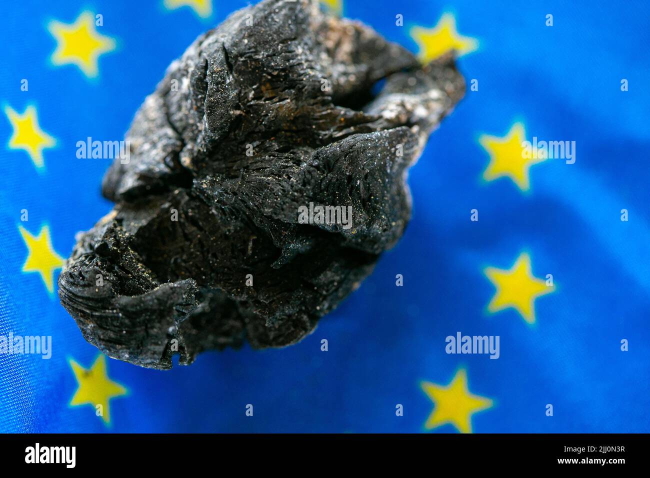 Charcoal on the EU flag.Buying and selling coal in the countries of the ...