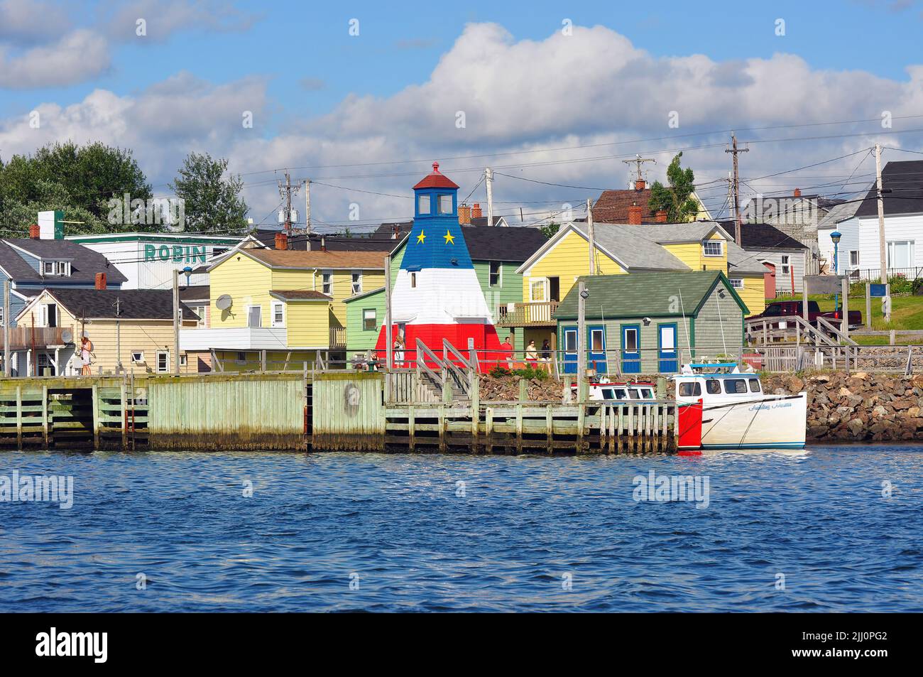 Cheticamp, Canada - July 31, 2010: The iconic Cheticamp Harbour ...