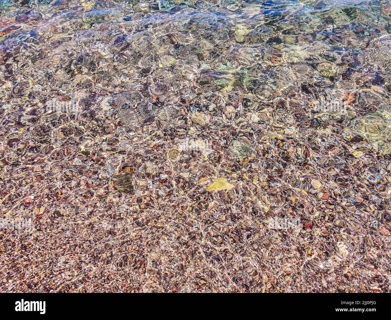 Rock and stones on the seashore on one of the beaches in Ras Shitan ...