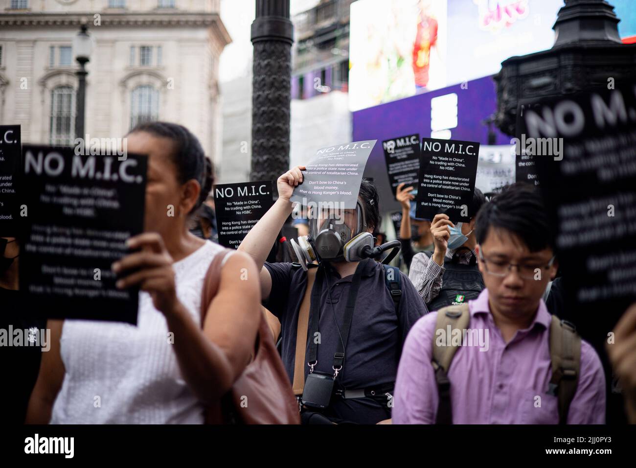 London, UK. 21st July, 2022. Protesters hold leaflets explaining the ...