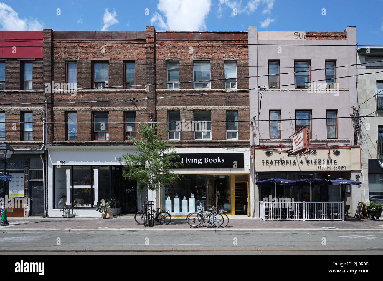 Old fashioned main street buildings with stores at street level and ...