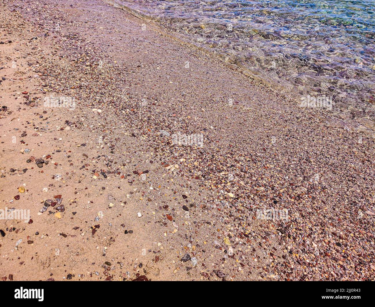 Rock and stones on the seashore on one of the beaches in Ras Shitan ...