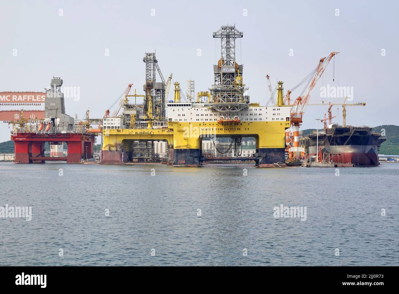 YANTAI, CHINA - JULY 21, 2022 - Many semi-submersible drilling platform ...