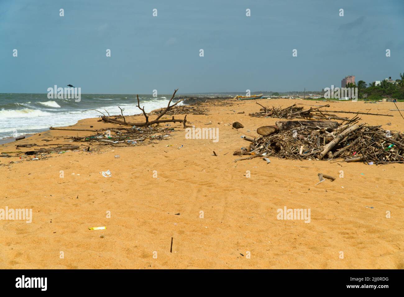 Discarded plastic debris trash pollution after sea swell storm ...