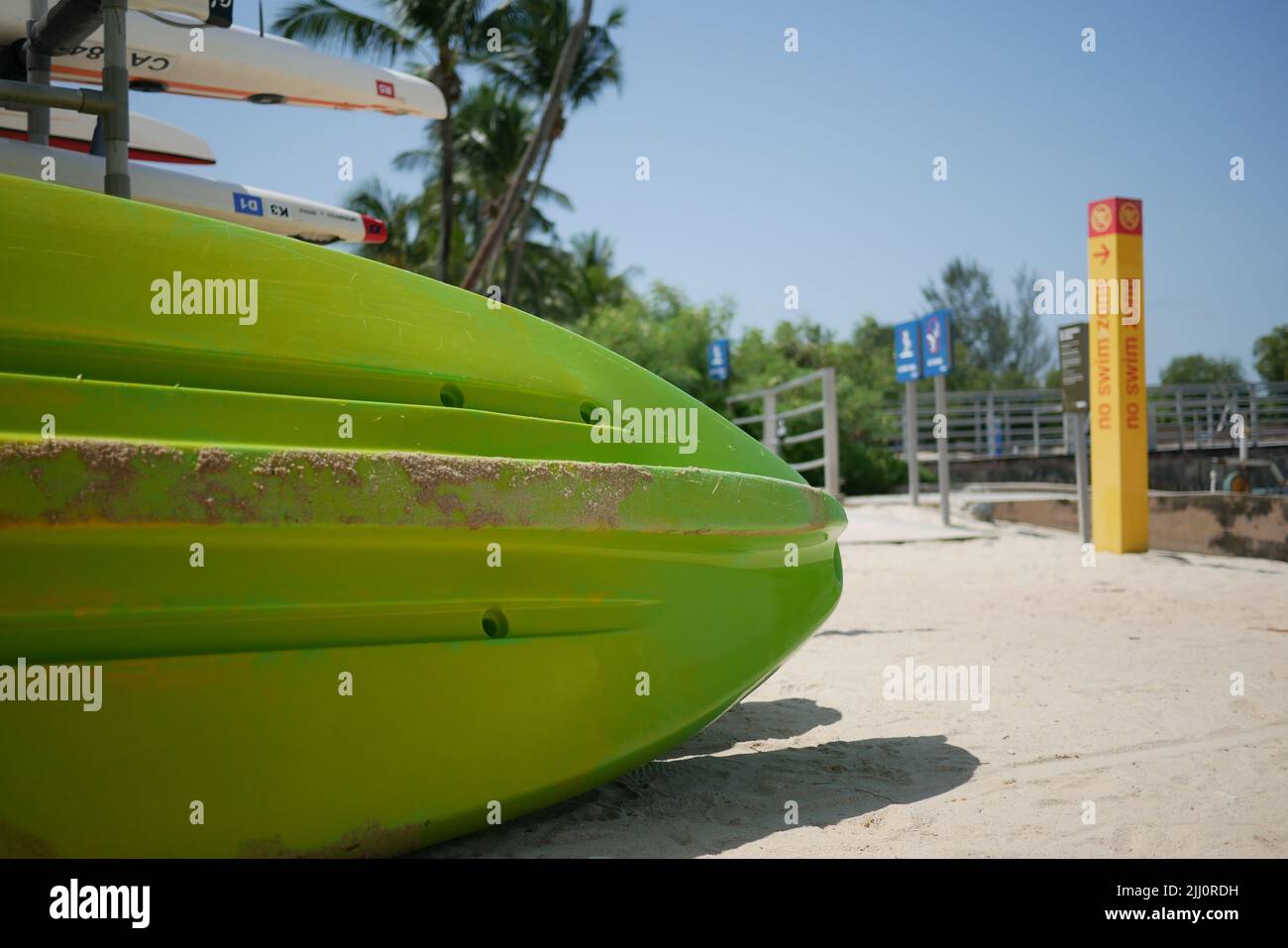green color surfboard at the beach Stock Photo - Alamy