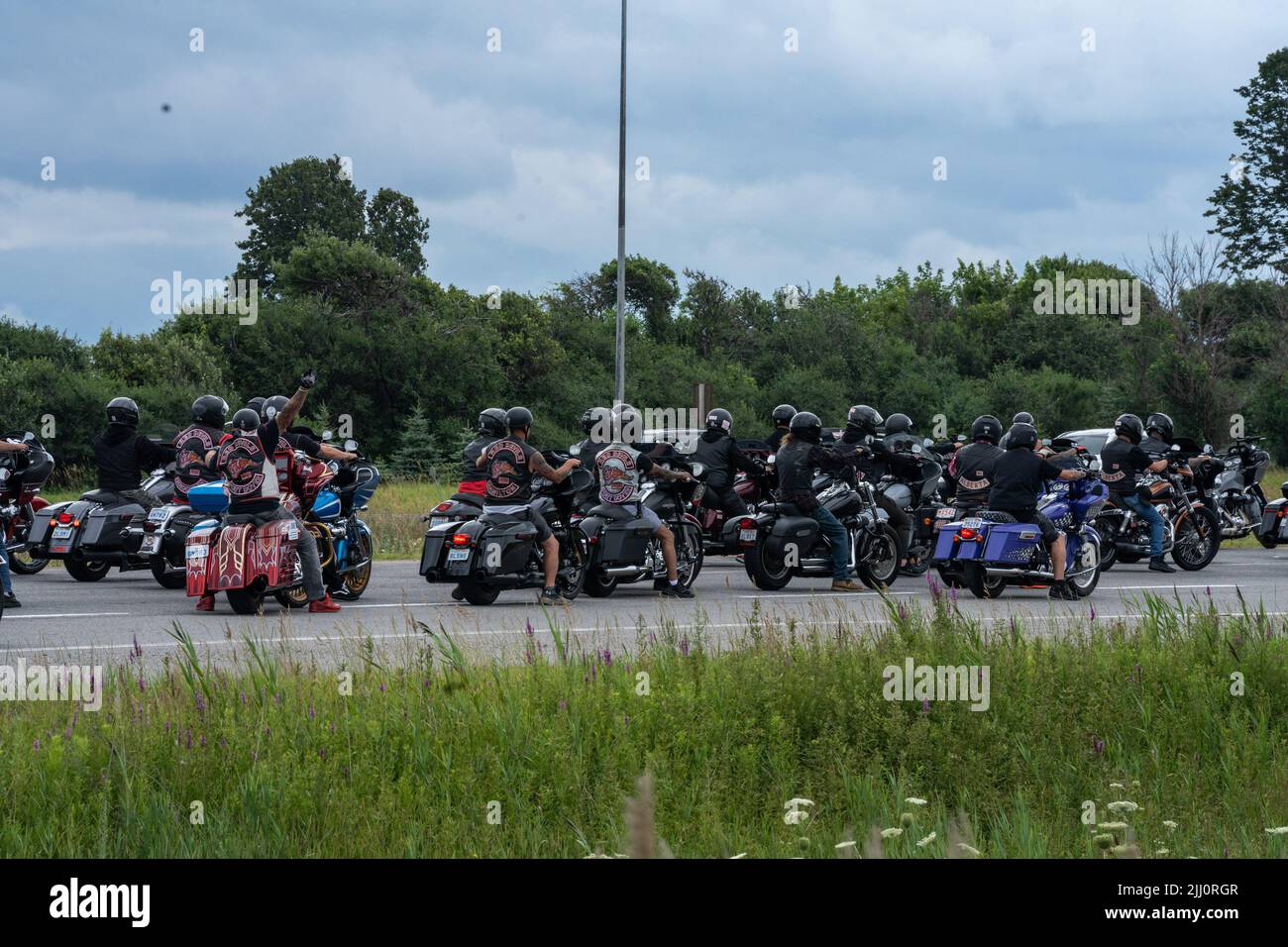 Aurora, Canada. 21st July, 2022. A procession of motorcycles along the ...