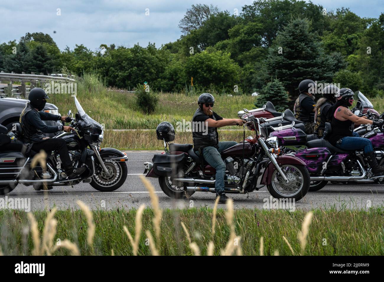 Aurora, Canada. 21st July, 2022. A procession of motorcycles along the ...