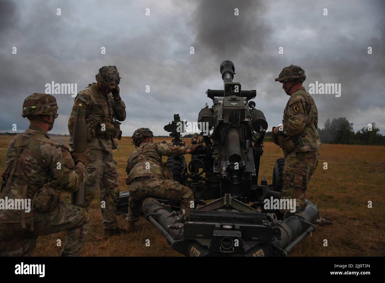 U.S. Army paratroopers assigned to A Battery, 4th Battalion, 319th Field Artillery Regiment ...