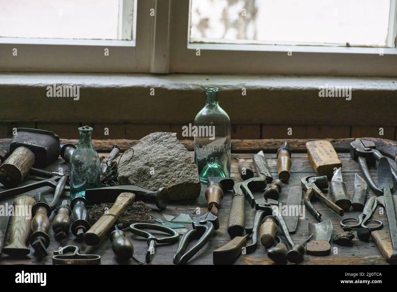 Shoemaker´s tools on table by window at Amuri Museum of historic ...