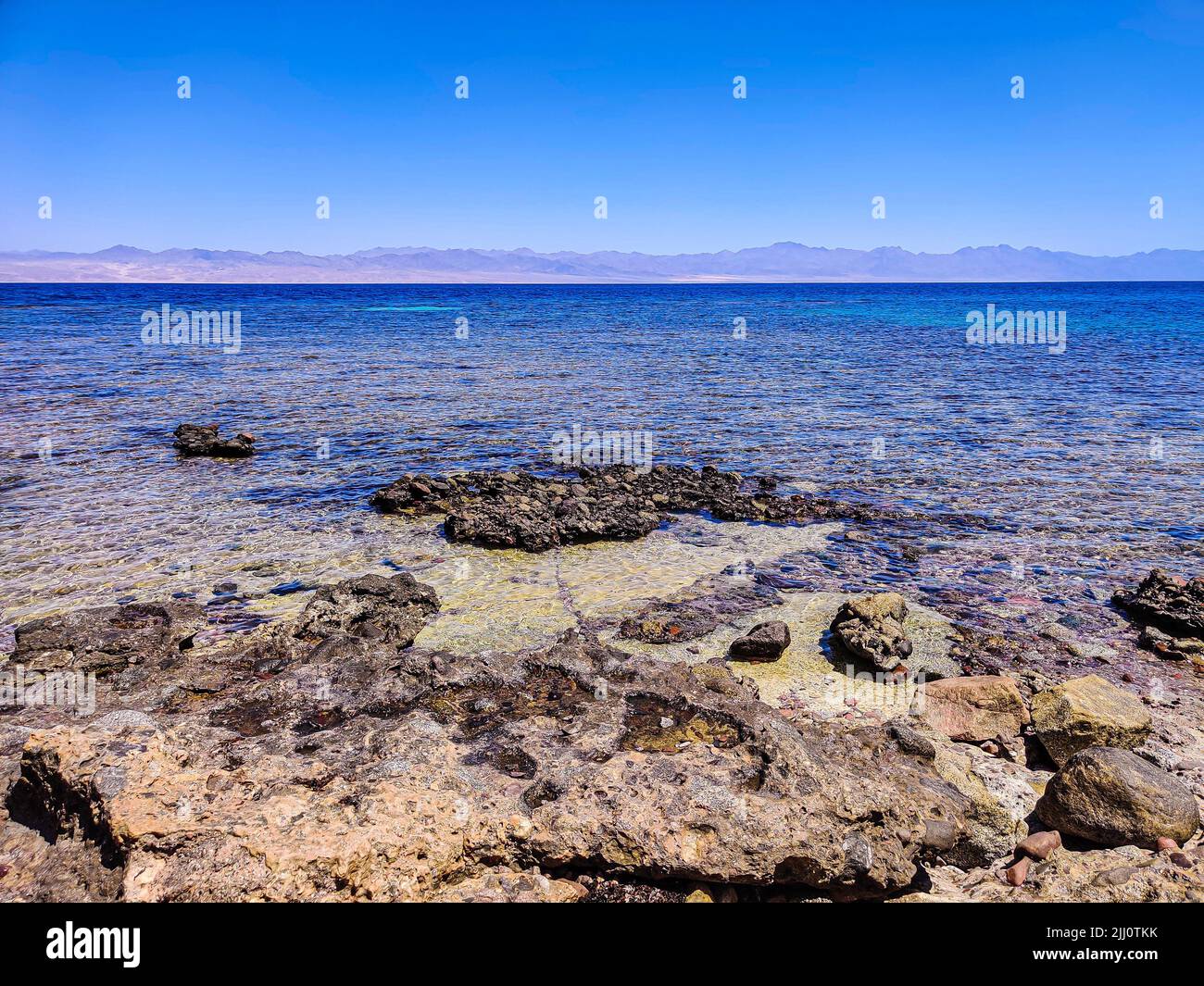 Seashore in Ras Shitan, Sinai, Egypt with Rocks and water Stock Photo ...