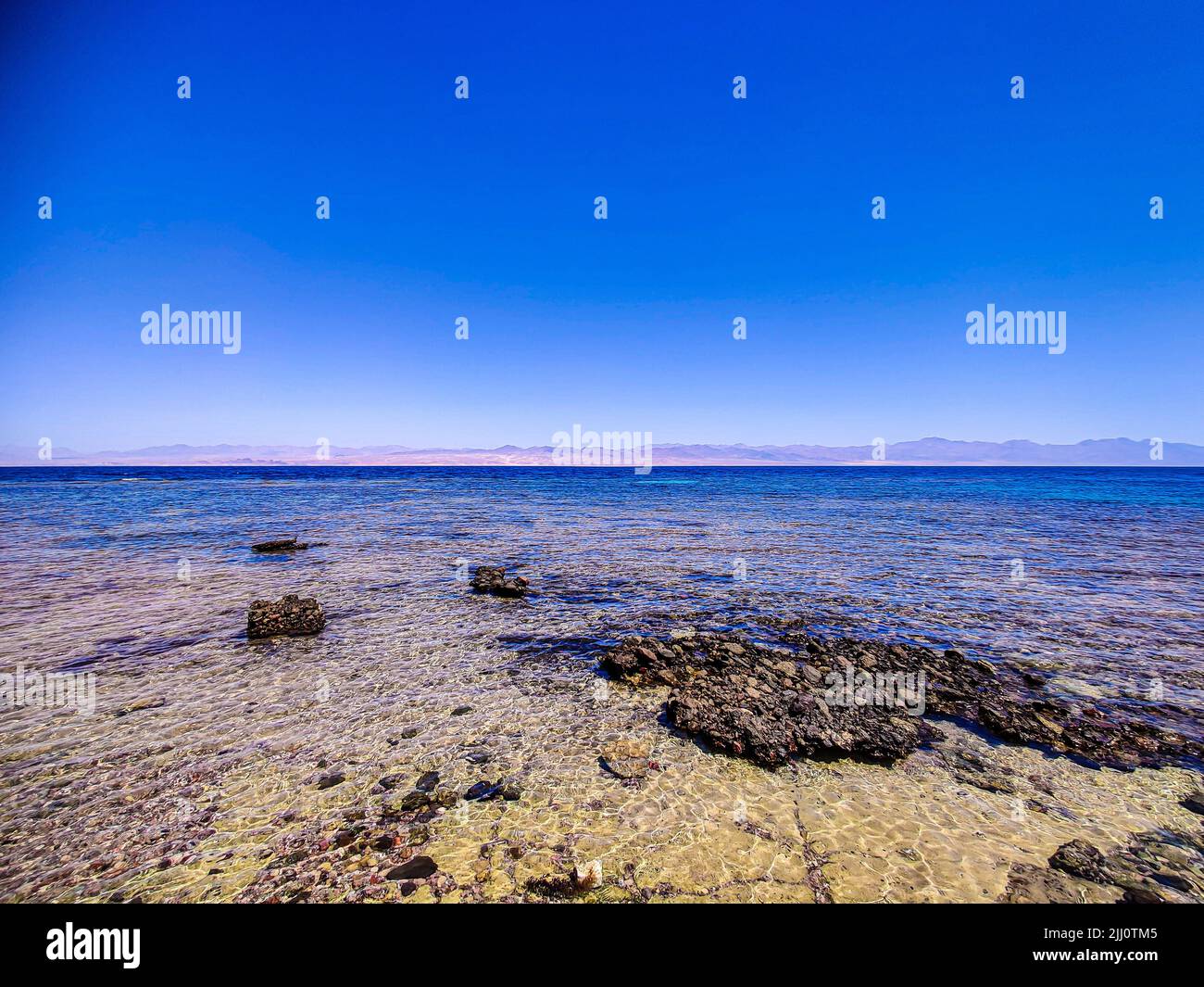 Seashore in Ras Shitan, Sinai, Egypt with Rocks and water Stock Photo ...