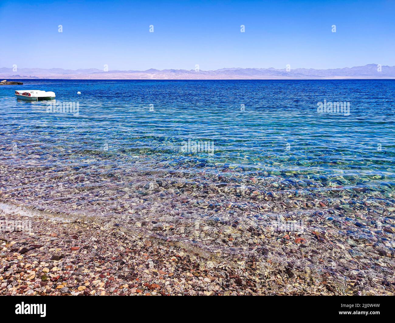 Rock and stones on the seashore on one of the beaches in Ras Shitan ...