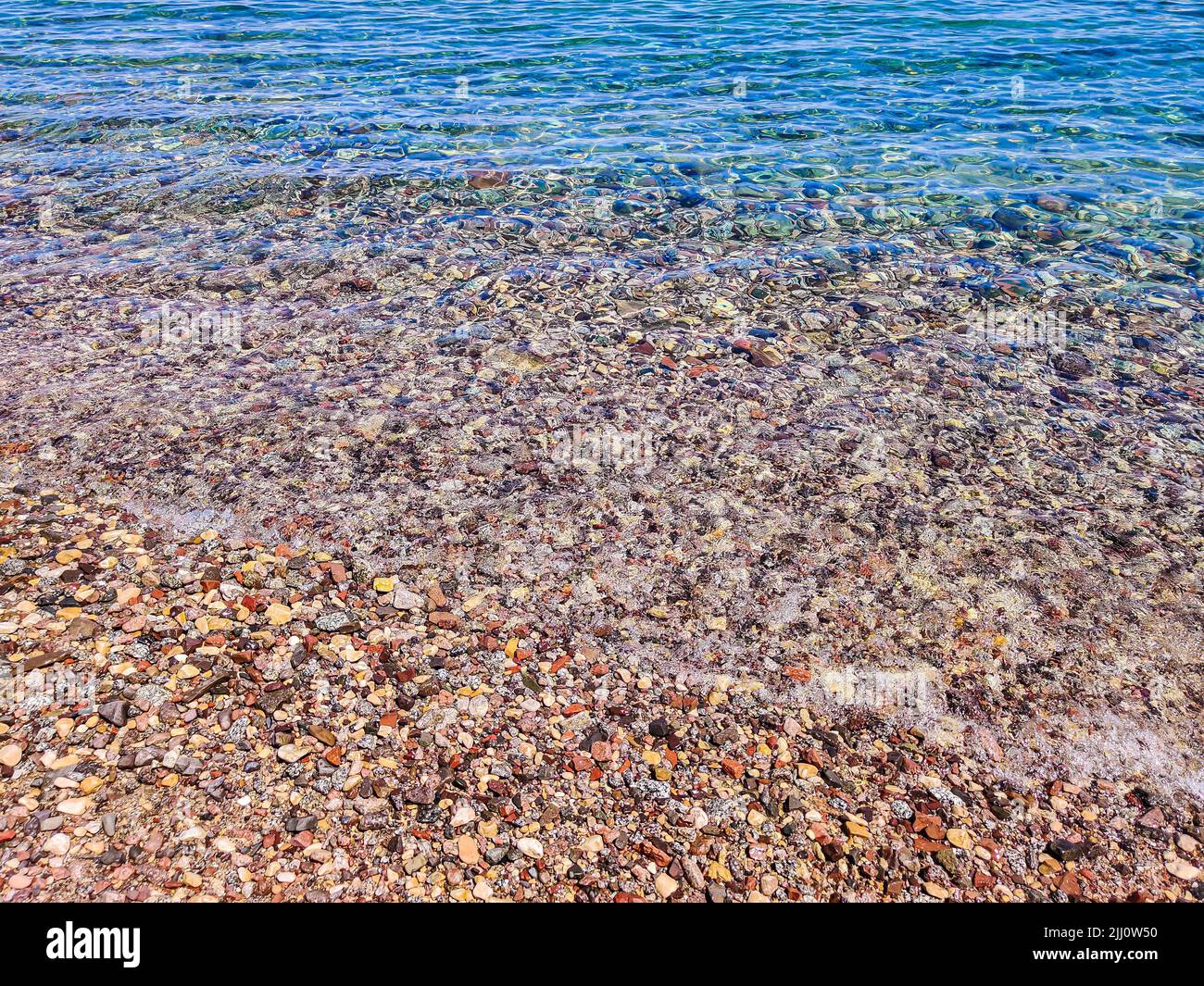 Rock and stones on the seashore on one of the beaches in Ras Shitan ...