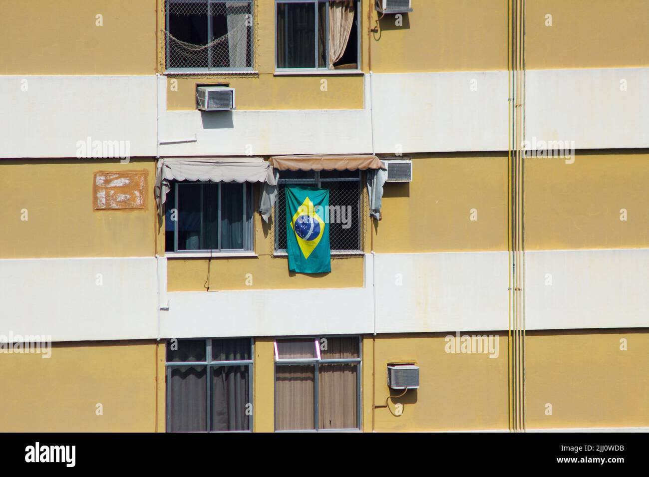 Brazilian flag in the window of a building in the Leblon neighborhood ...