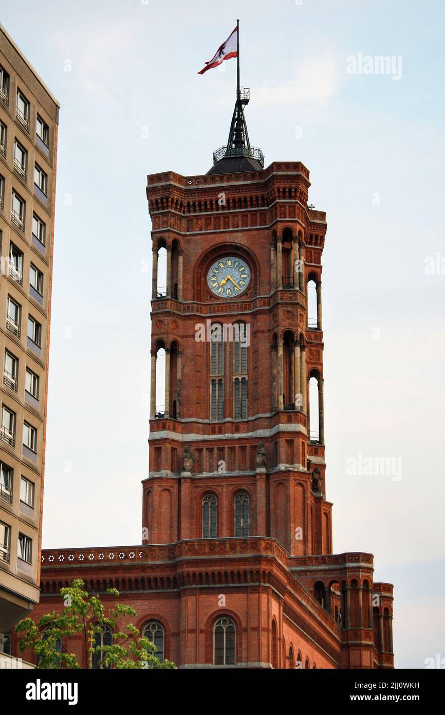 View of tower and clock of Rotes Rathaus in summer, the famous red town ...
