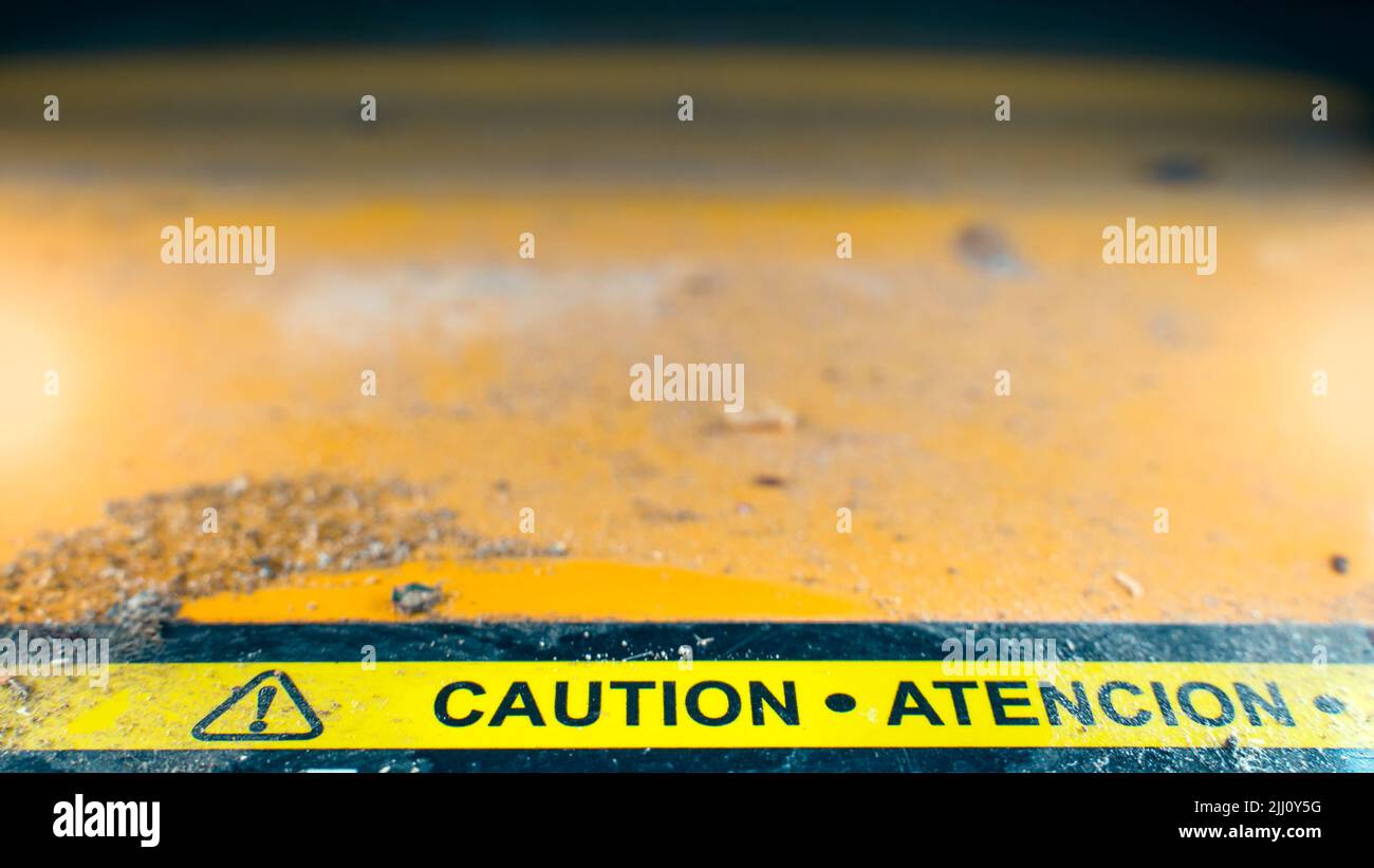 Hazard warning sticker on the gas tank of a gas generator close-up ...