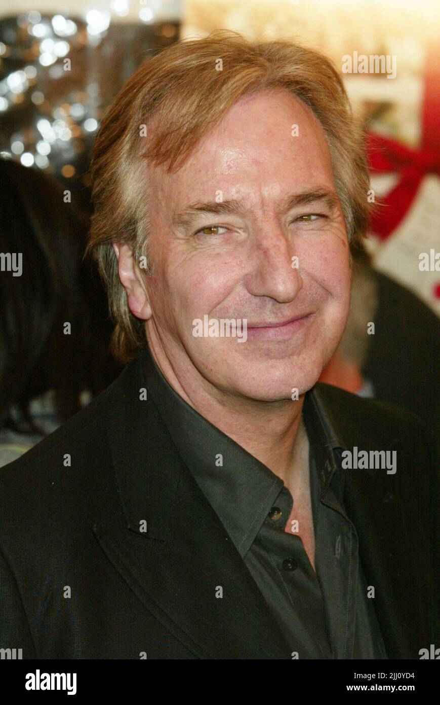 Alan Rickman arriving at the world premiere of "Love Actually" at The ...