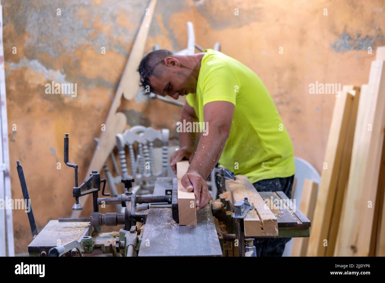 master carpenter treating the wood to work with it Stock Photo - Alamy