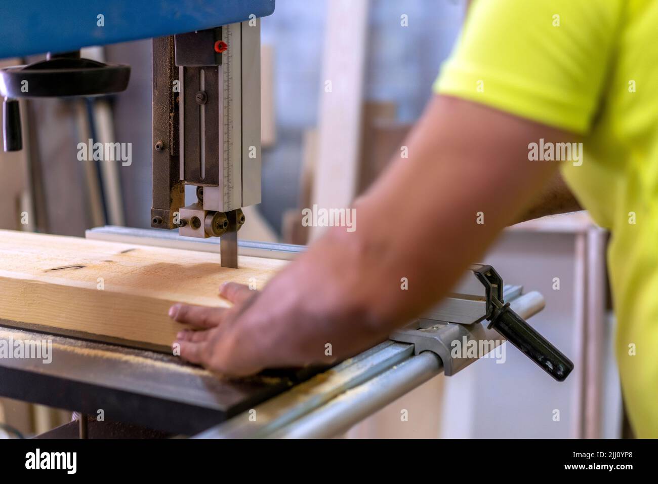 master carpenter cutting wood in his workshop Stock Photo - Alamy