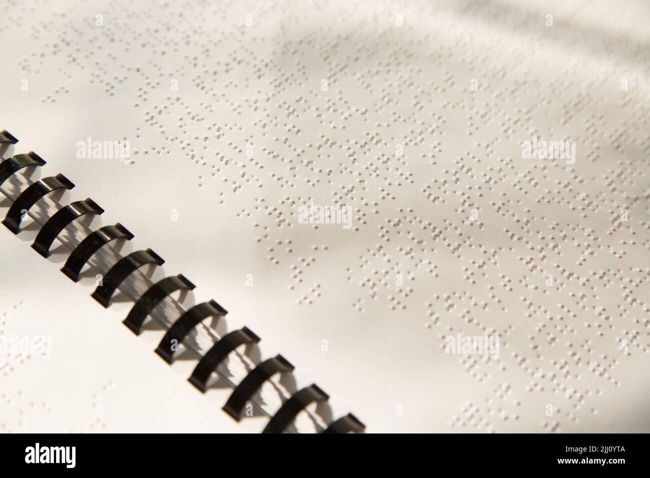 White page of reading book with braille Stock Photo - Alamy