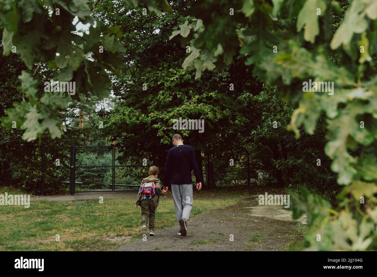 Kid in the forest with father. Family and nature loving concept Stock ...