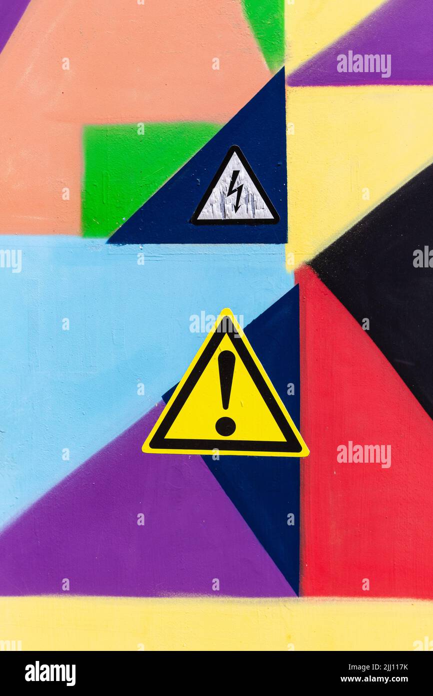 abstract multi-colored geometric pattern made with oil paints on ...