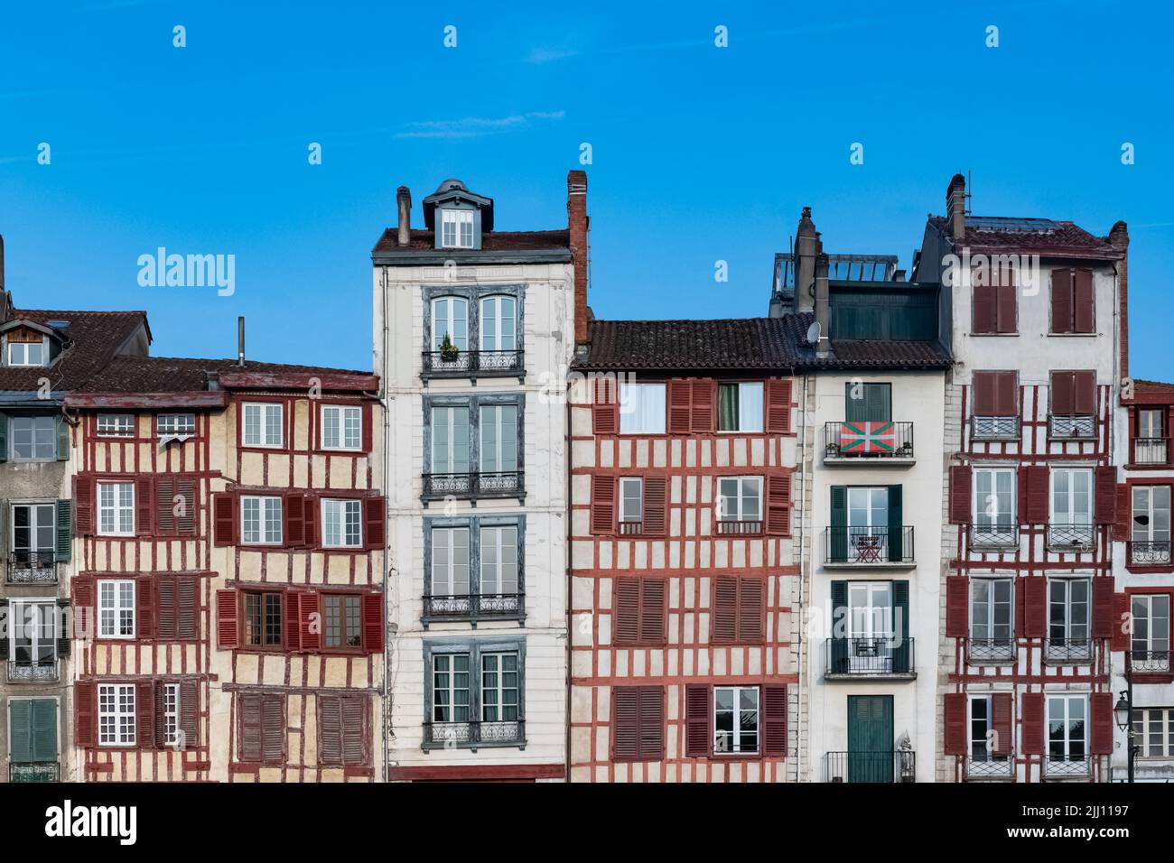 Bayonne in the pays Basque, typical facades and bridge on the river ...