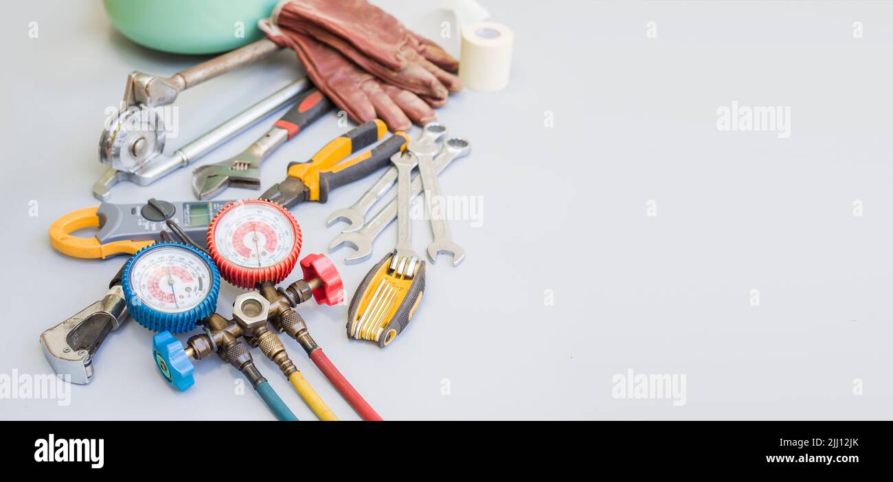 Tools for air conditioning repair and maintenance Stock Photo - Alamy
