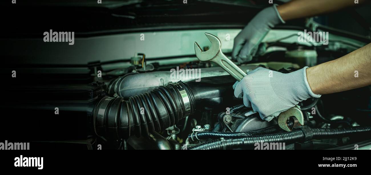 Hand of car mechanic with a wrench hi-res stock photography and images ...
