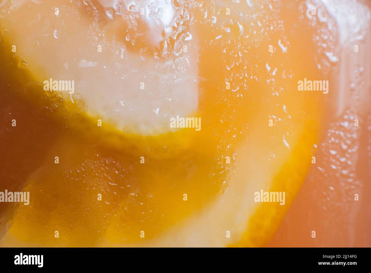 Background of fresh cold citrus lemonade Stock Photo - Alamy