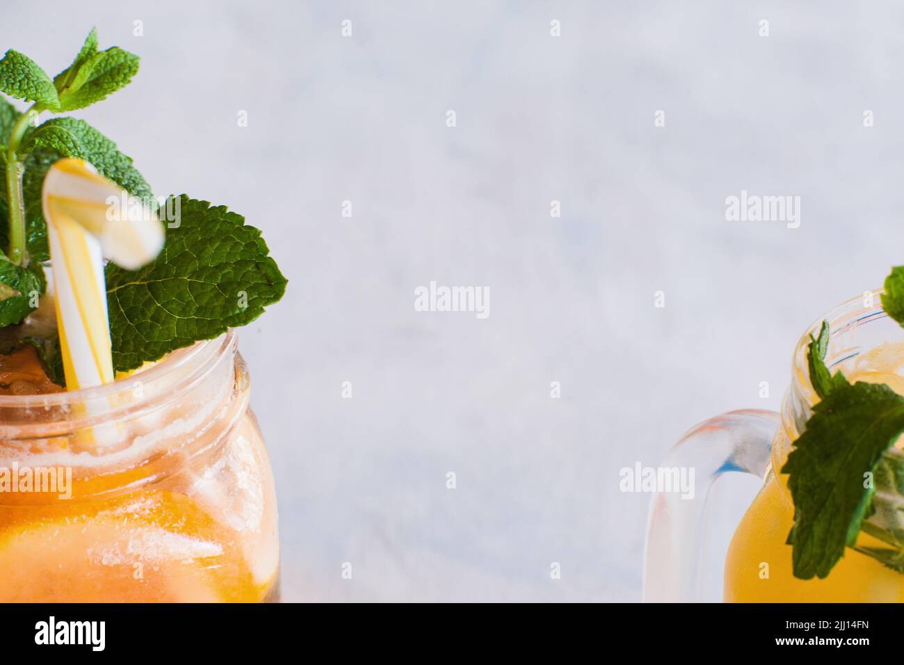 Close up of partially seen fresh fruit cocktails Stock Photo - Alamy