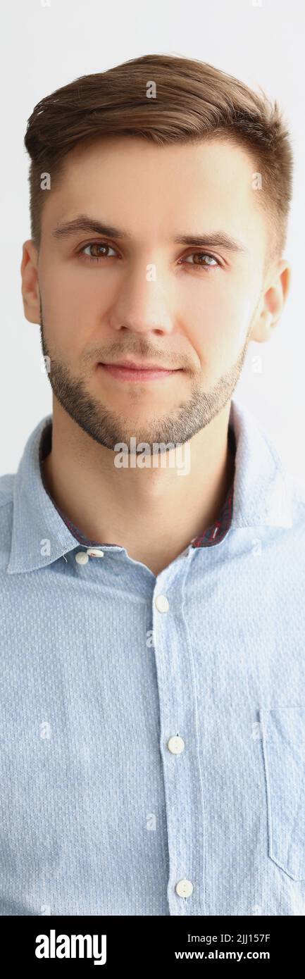 Successful young man in stylish grey shirt, presentable guy posing on ...