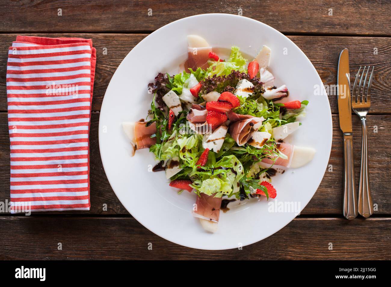 Fresh salad with parma ham and blue cheese Stock Photo - Alamy