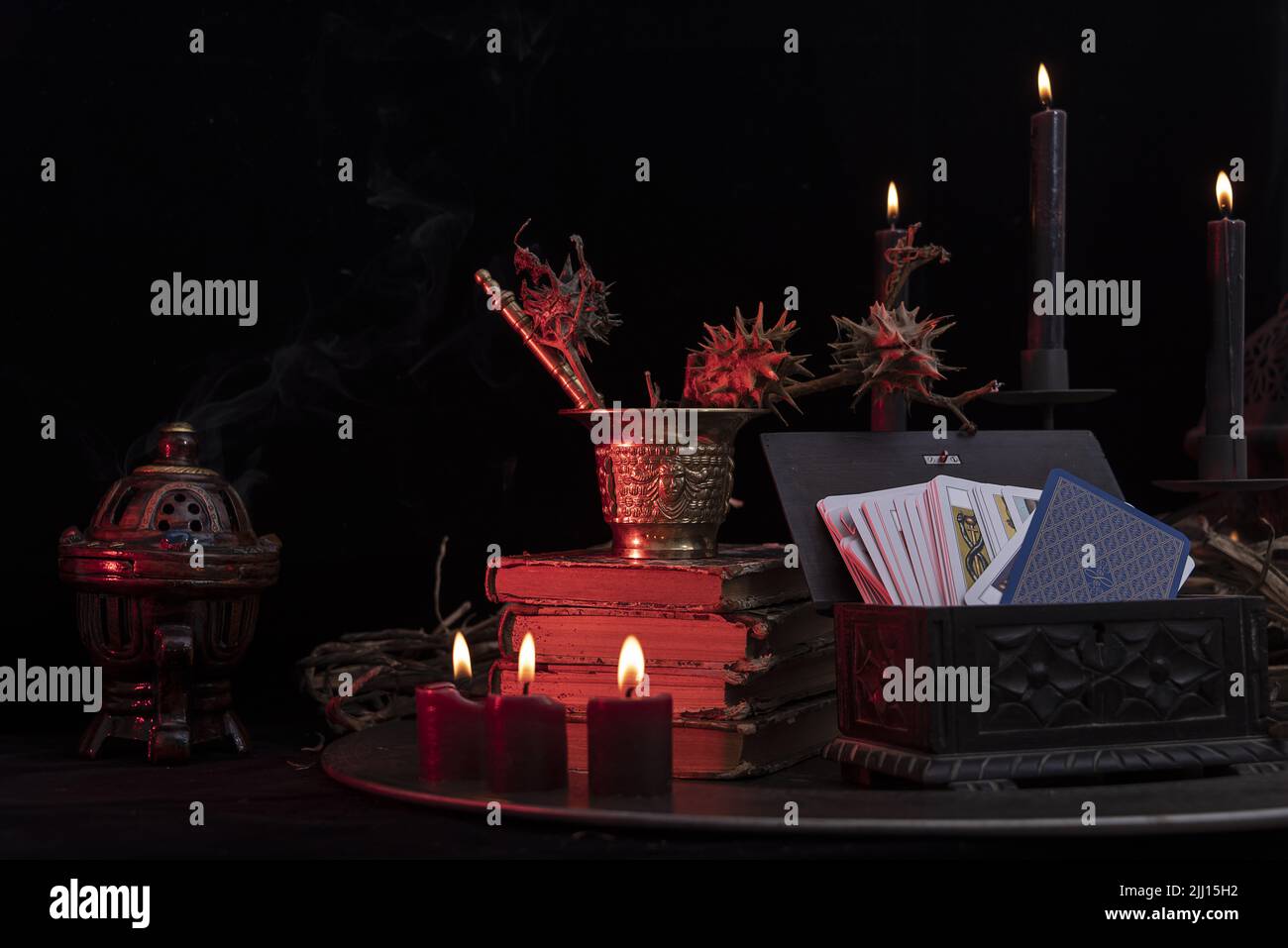 Witch laboratory with potion, elixirs, glass bottles, dry flowers ...