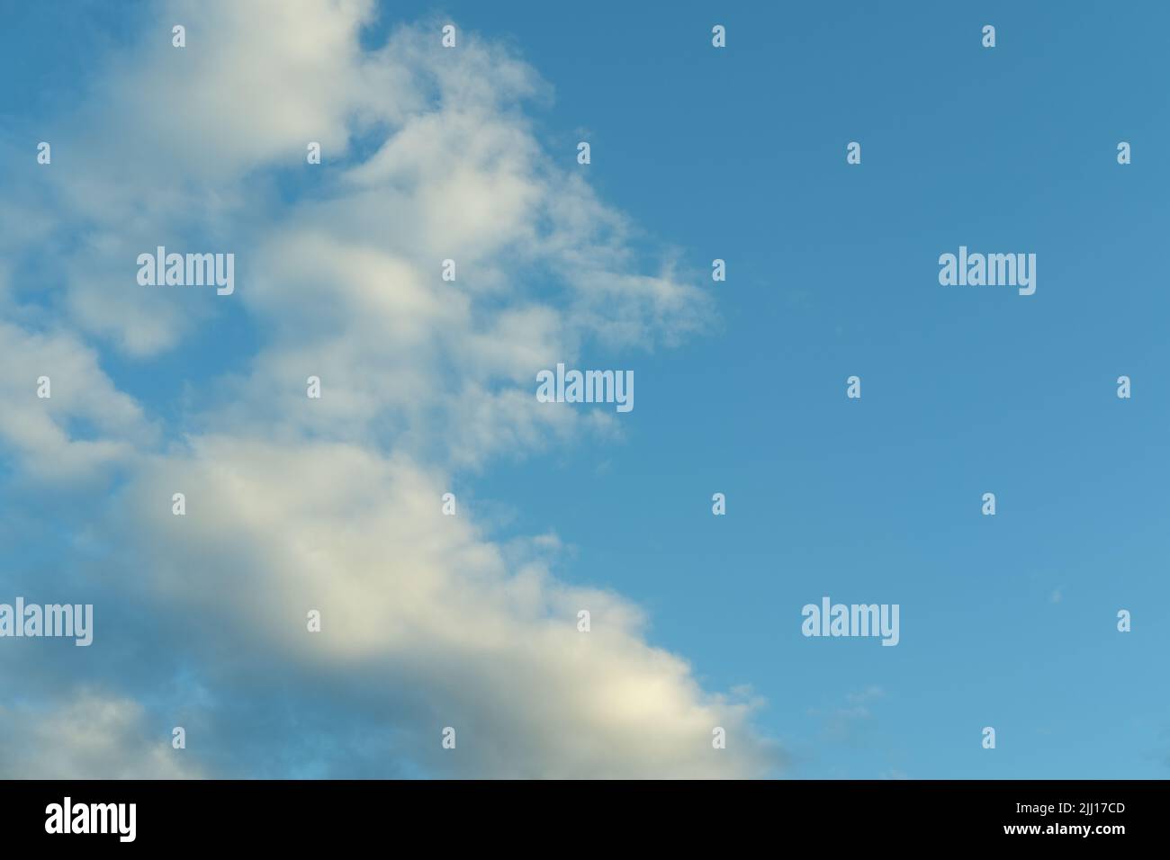 Blue sky background with white fluffy cumulus clouds. Panorama of white ...