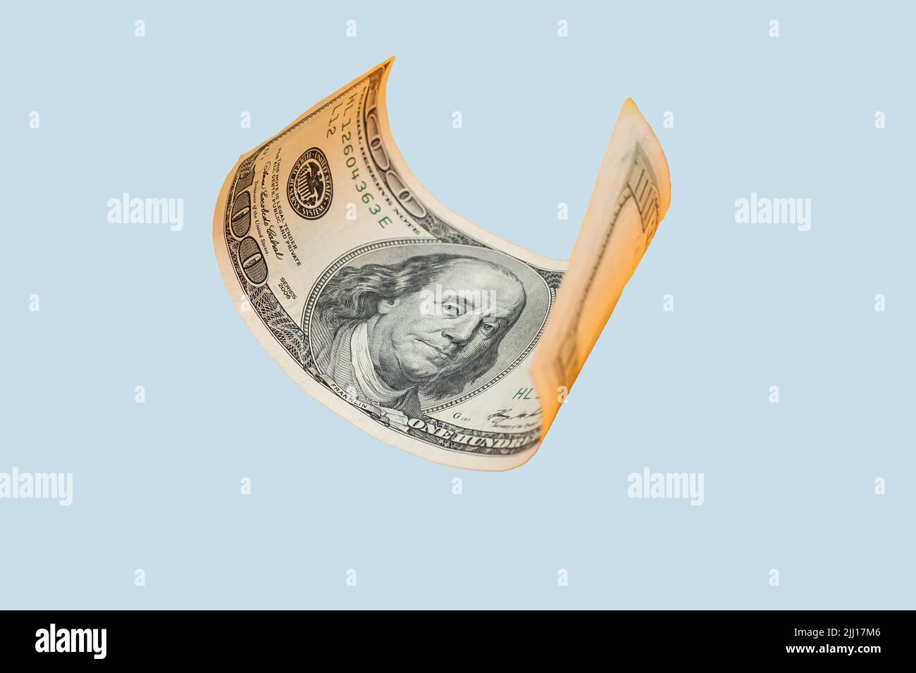 Flying 100 American dollars banknote, isolated on white background ...